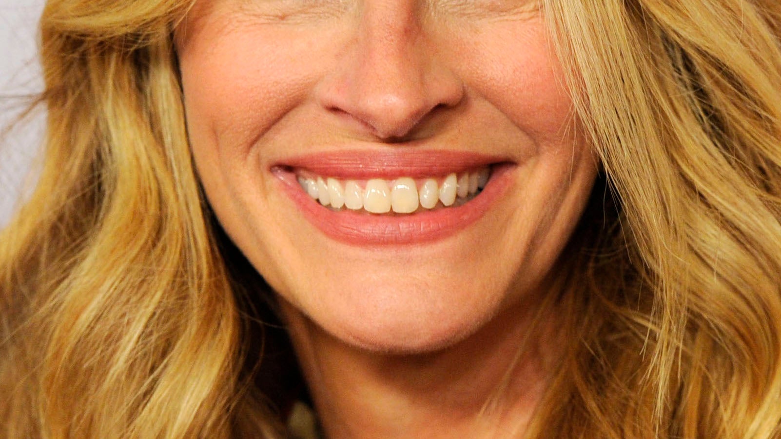 Here are all the different types of smiles, according to science