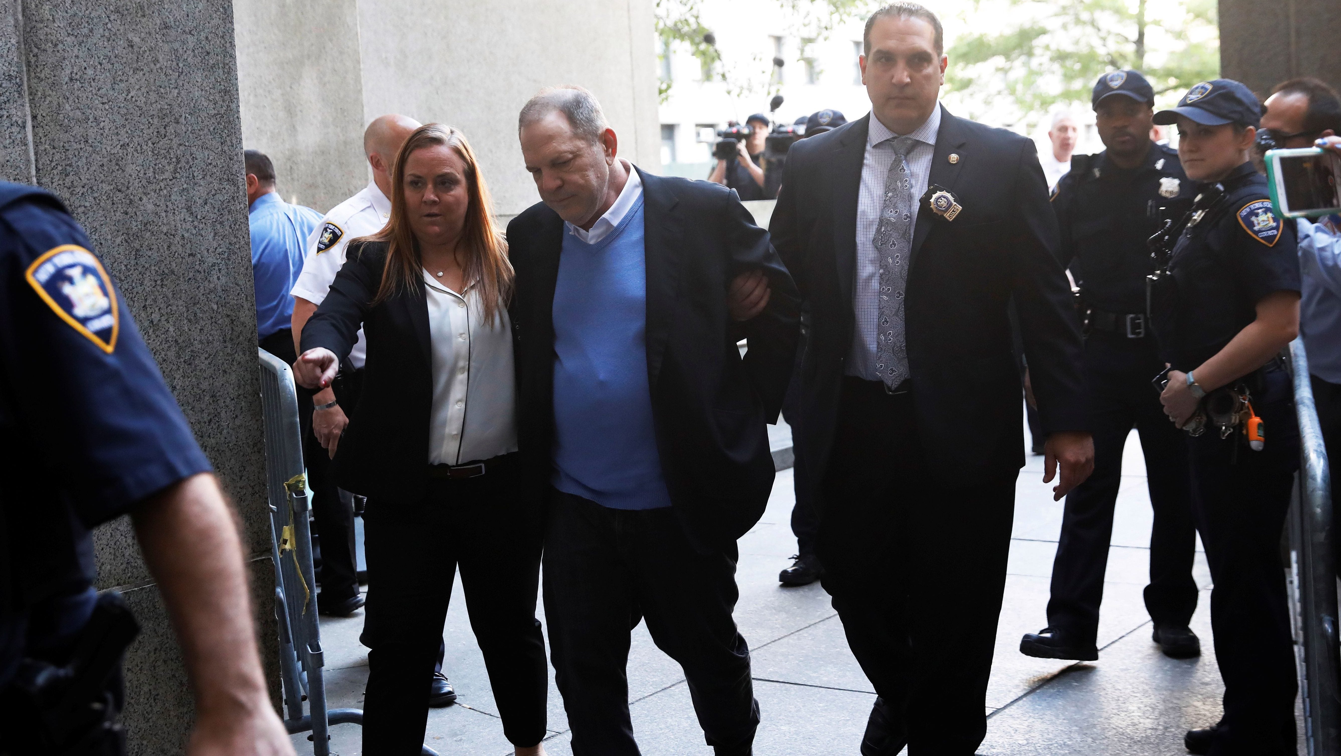 Photos: After months in hiding, Harvey Weinstein appears in handcuffs