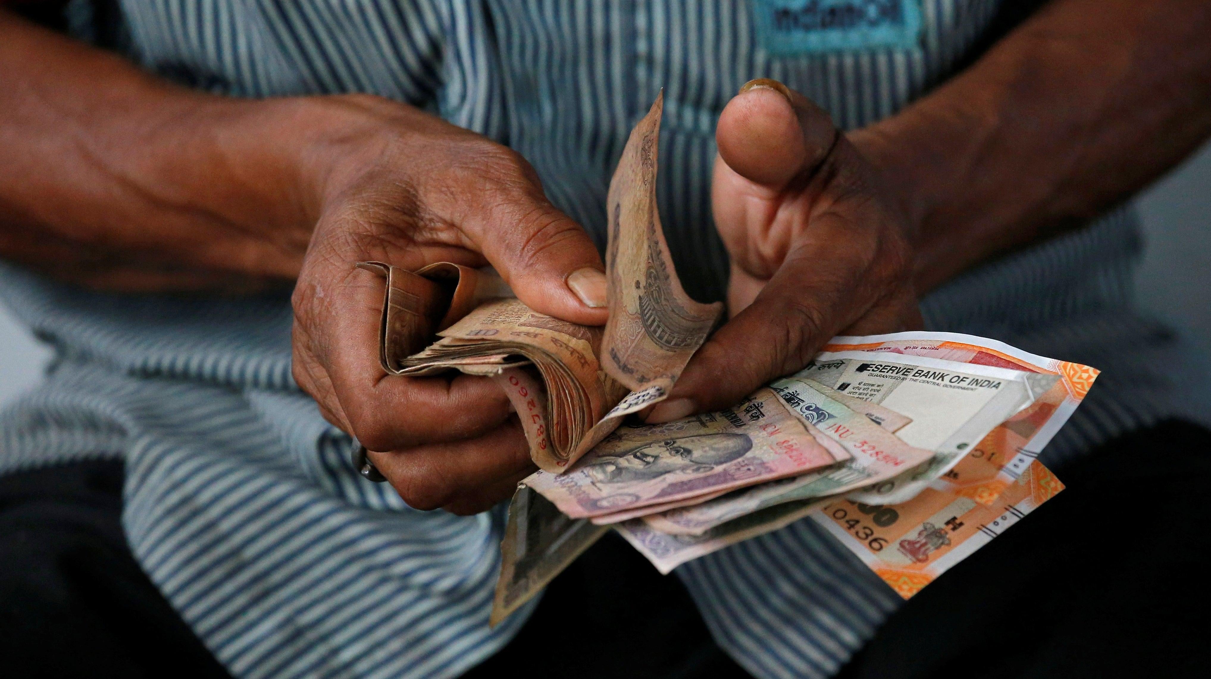 India has spent more than $80 billion this year to save the rupee