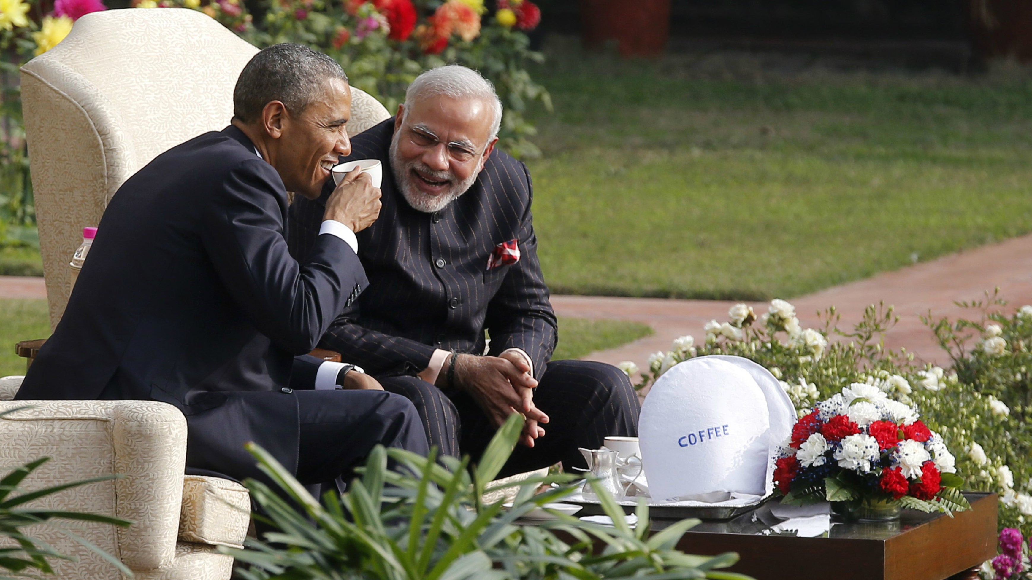 Narendra Modi met with Obama in a suit pin-striped with his own name ...