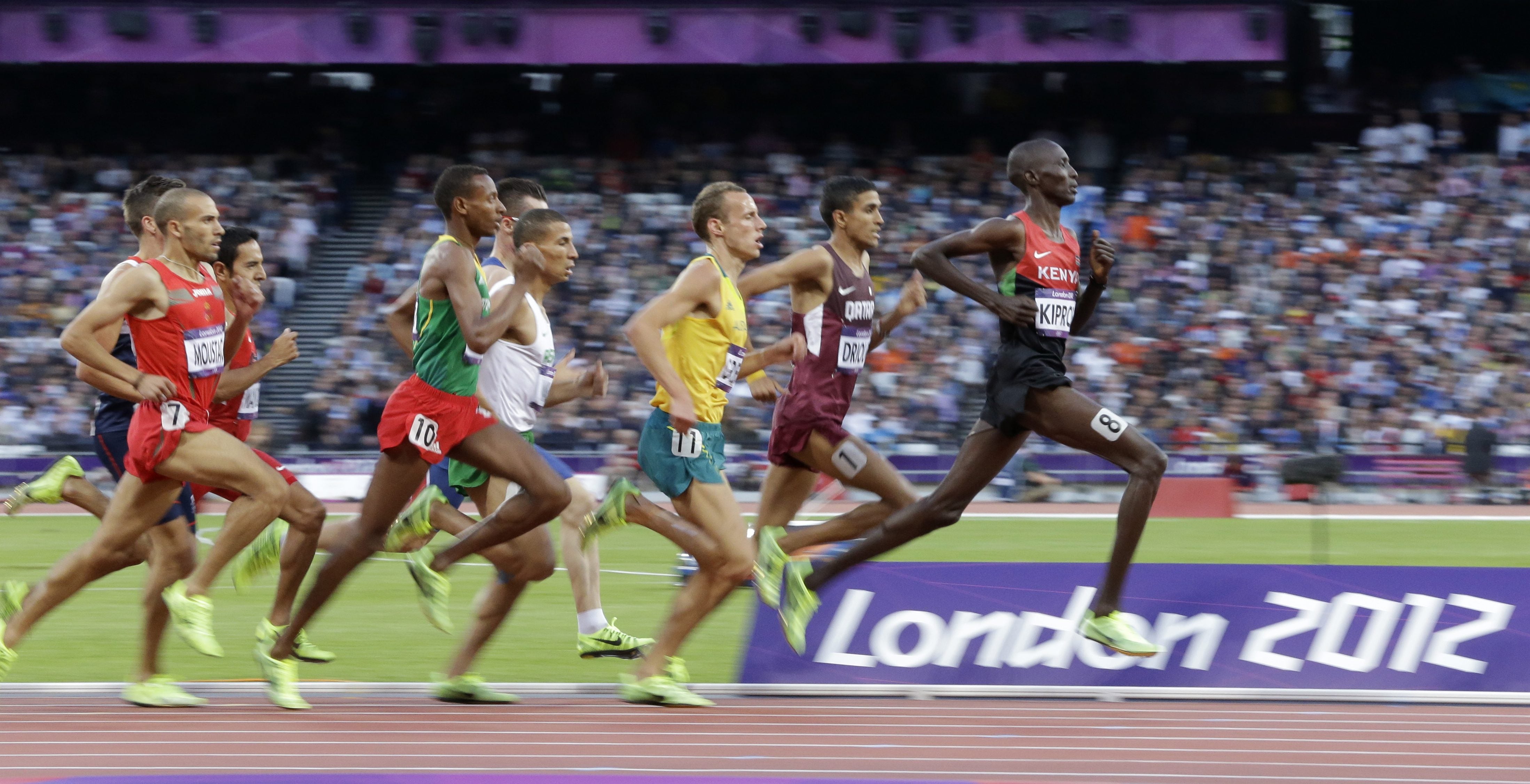 Why do Olympic runners race in the 1,500 meters instead of the mile?